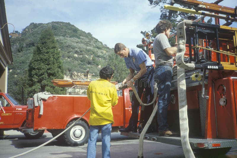 Volunteer firefighters editorial stock photo. Image of together - 26273153