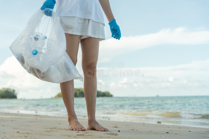 Volunteer Pick Up Trash Garbage at the Beach and Plastic Bottles are ...