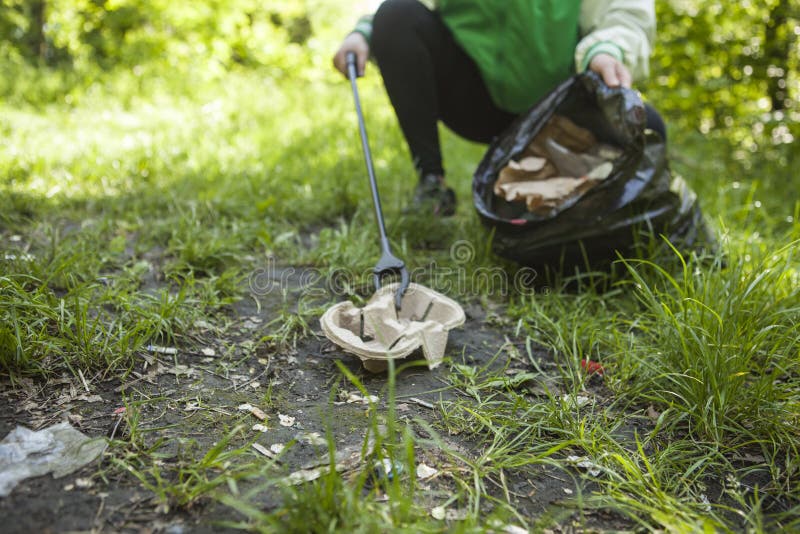 Volunteer Picking Trash with Garbage Picker Stock Image - Image of ...