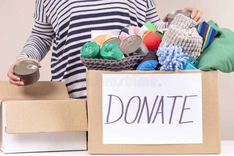 Volunteer Preparing Animal Donation Box for Animal Shelter Stock ...