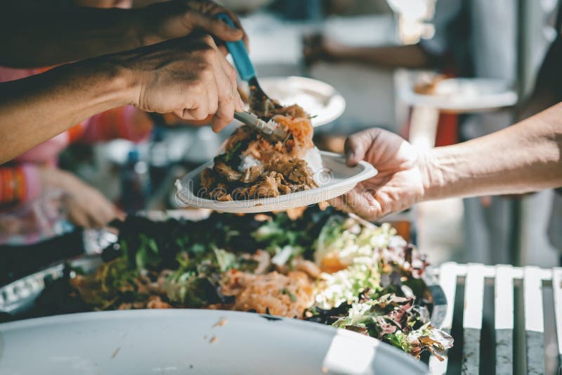 Volunteer Serving Food for Poor People : Sharing Food Helps the Poor ...