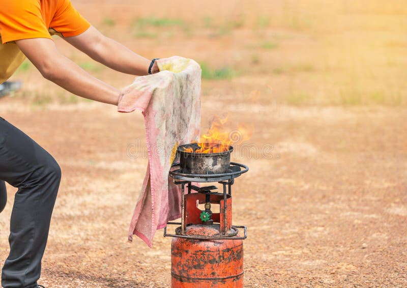 Volunteer Using Wet Cloth or Damp Cloth Beat the Flame Out during Basic ...