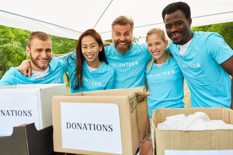 Volunteers with Donation Boxes are Happy Stock Image - Image of smile ...
