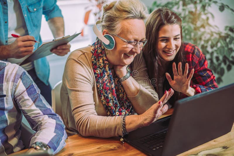 Volunteers Help Senior People on the Computer Stock Photo - Image of ...