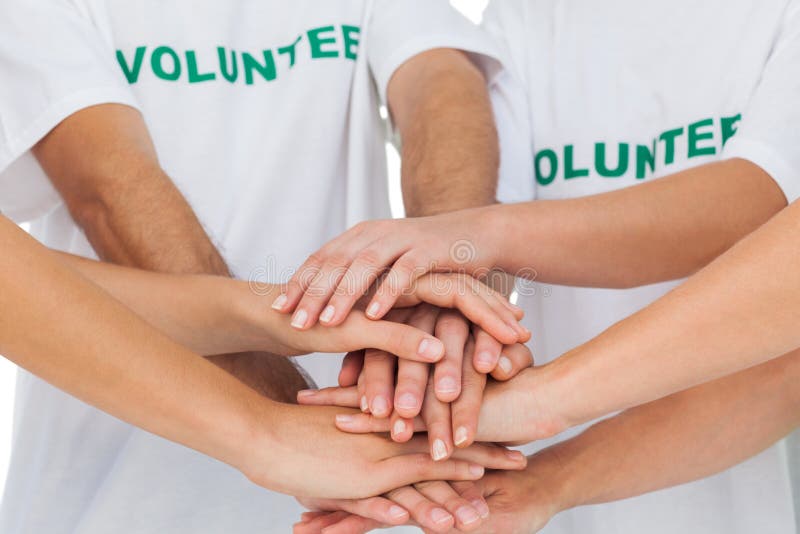 Volunteers Piling Up Their Hands Together Stock Photo - Image of piling ...
