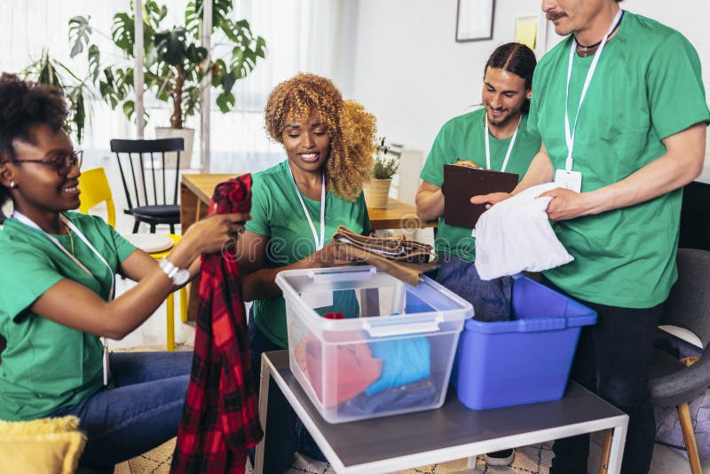 Volunteers Putting Clothes in Donation Boxes, Social Worker Making ...