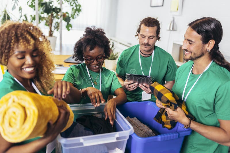 Volunteers Putting Clothes in Donation Boxes, Social Worker Making ...