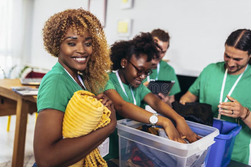 Volunteers Putting Clothes in Donation Boxes, Social Worker Making ...