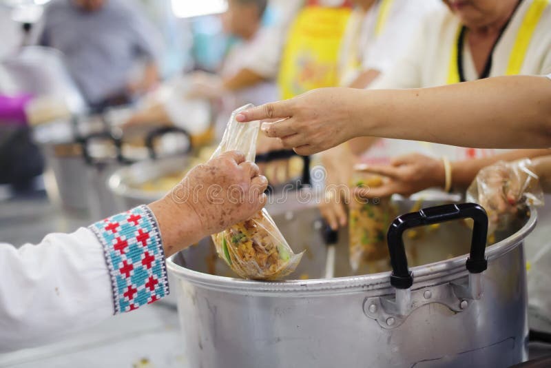 Volunteers Serving Food for Poor People : Food Sharing Concept Stock ...