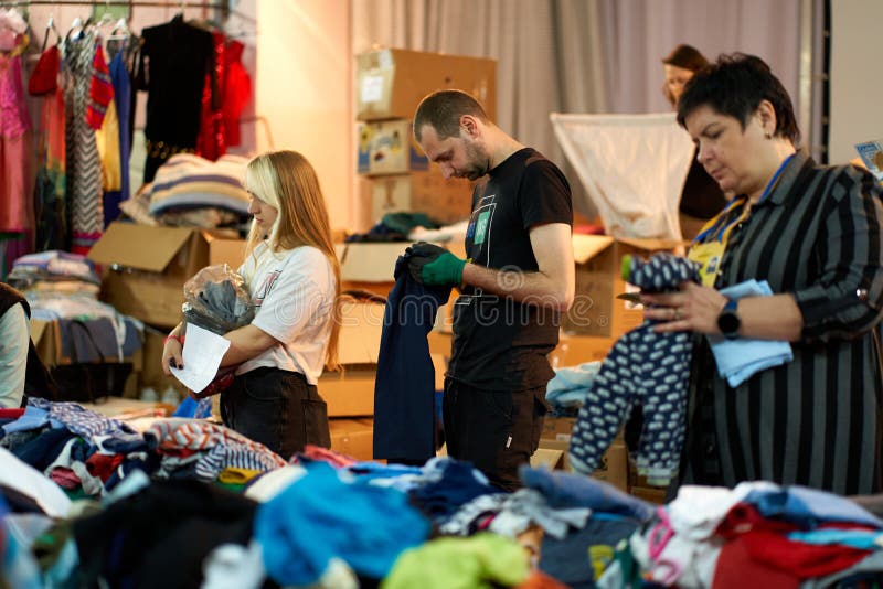 Volunteers Sorting Second Hand Clothes Gaved As Aid for Temporary Moved ...