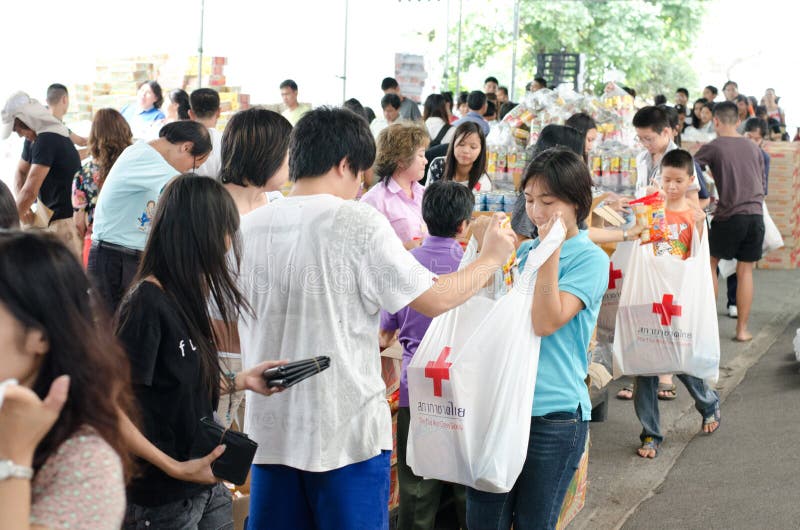 Volunteers To Help Line Up the Bag Editorial Photo - Image of damage ...