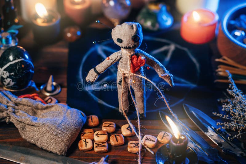 Voodoo Doll among Burning Candles and Magical Ritual Items for Dark ...