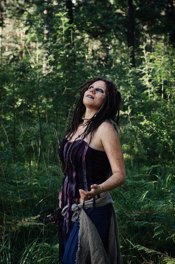 Voodoo witch in the woods. stock photo. Image of blood - 110436664