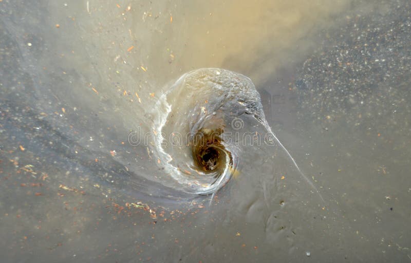 Vortex in Water Over a Drain Stock Image - Image of rain, torrential ...