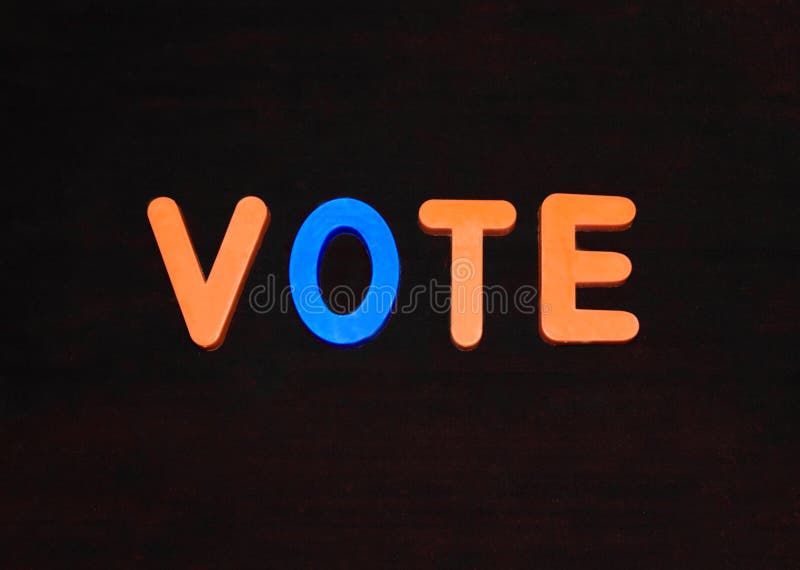Vote Word Written with Different Colored Letter Blocks on a Dark ...