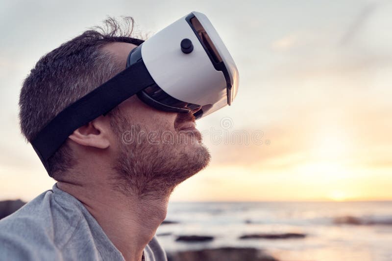 VR, Beach and Metaverse with a Man in a Nature Using a Wireless Headset ...