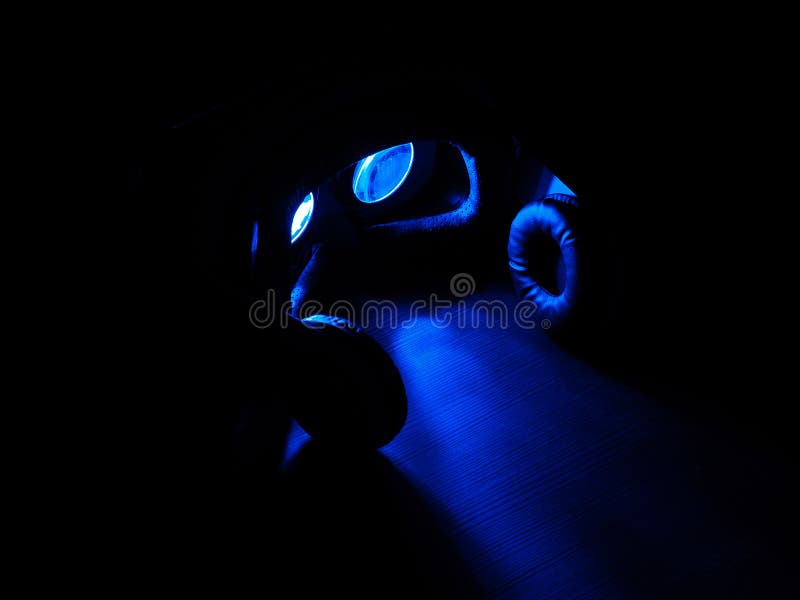 VR Device Playing Movie Inside at Night. Stock Image - Image of device ...