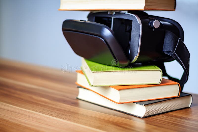VR Glasses and Books on a Table Symbolizing Digital Learning Stock ...