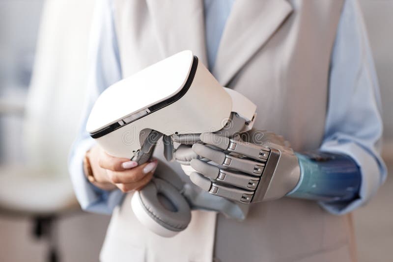 VR Headset in Prosthetic Hand Stock Photo - Image of prosthetic ...