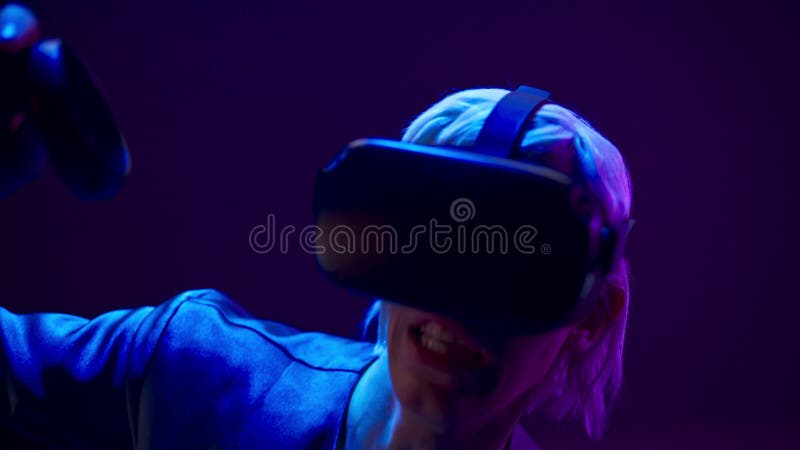 VR Headset Youngster Playing Augmented Reality Simulation. Man Using ...