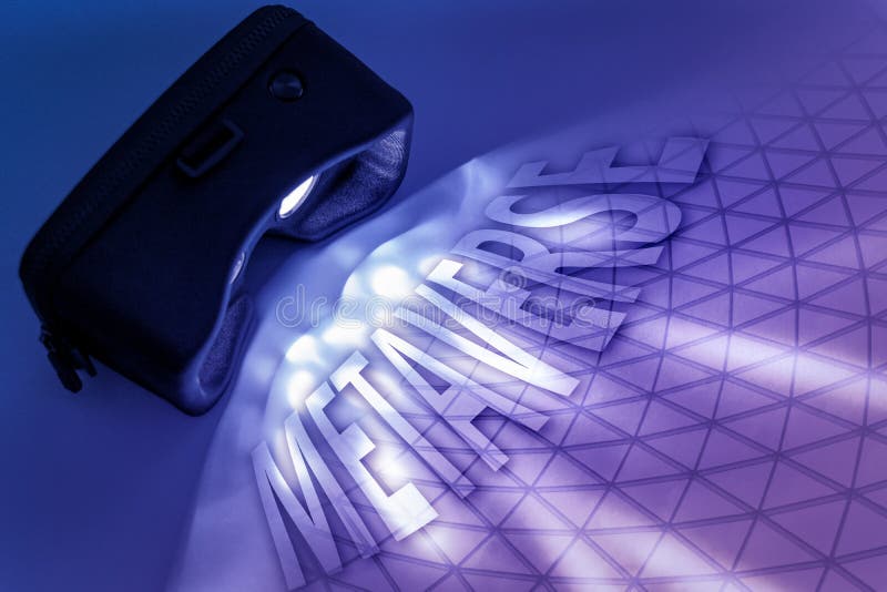 VR Virtual Reality Headset Light Projecting the Word Metaverse on a ...