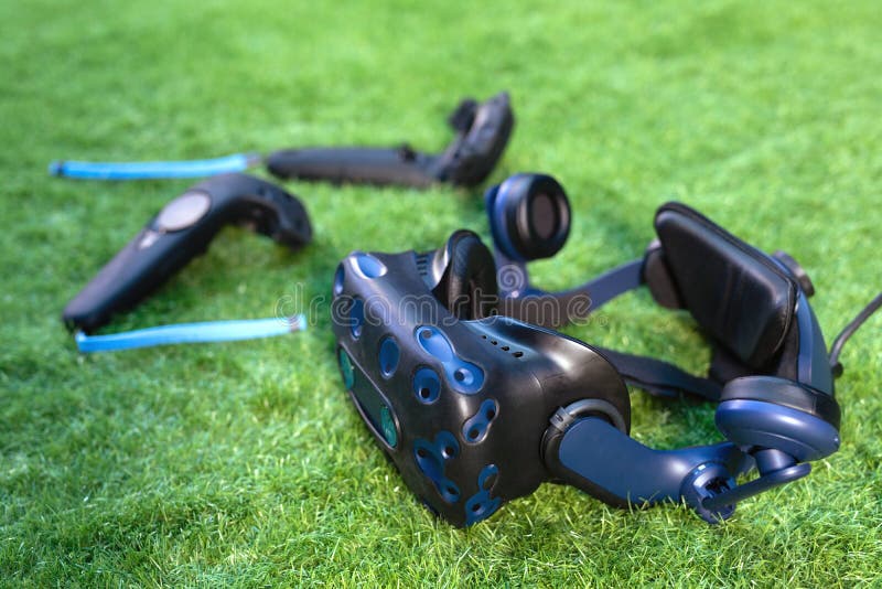 VR Virtual Reality Headset and Two Controllers Over Green Background ...