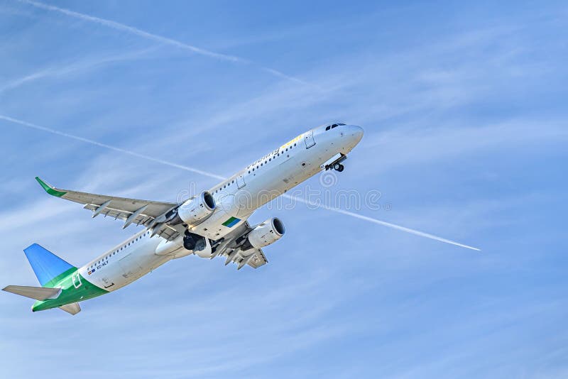 Vueling Airbus A321 Passenger Airplane Soaring through the Bright Blue ...