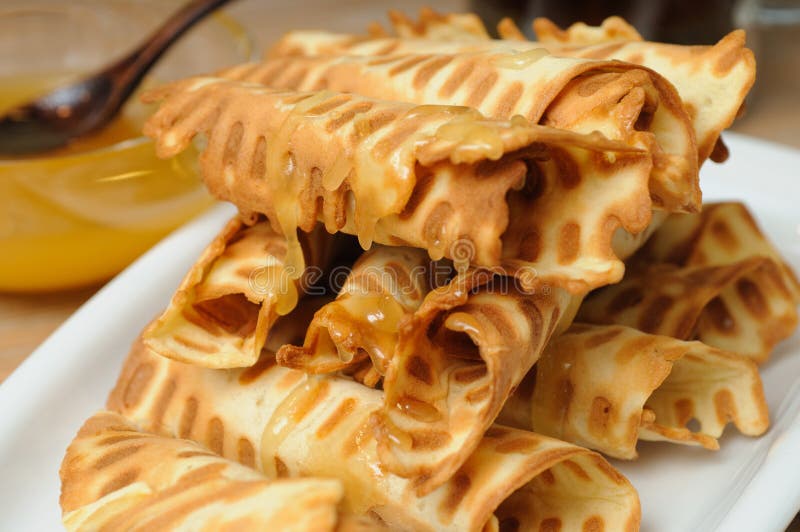 Wafer rolls on the table stock image. Image of baking - 211511957