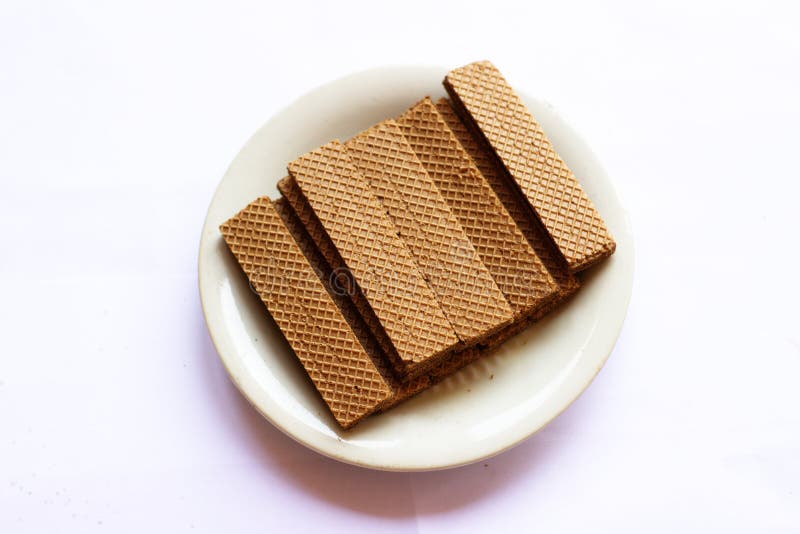 Waffer Snacks on White Plate Stock Image - Image of chocolate, icing ...