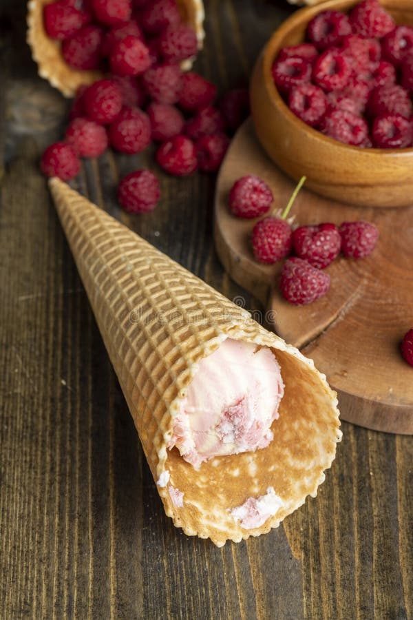 Waffle Cone with White Pink Cream Ice Cream and Raspberries Stock Image ...
