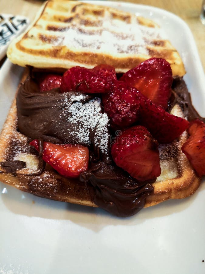 A Waffle with Strawberries, Chocolate and Sugar for the Breakfast Stock ...