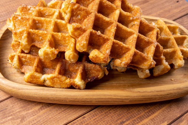 Waffle on a Plate on the Wooden Table Stock Image - Image of table ...