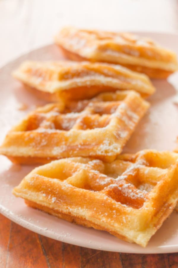 Waffle with Powdered Sugar on Plate Stock Photo - Image of icing, meal ...