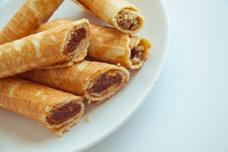 Waffle rolls stock photo. Image of roll, dark, stick - 77023702
