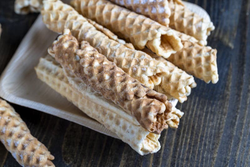 Waffle Tubes on a Wooden Table Stock Image - Image of bakery, milk ...