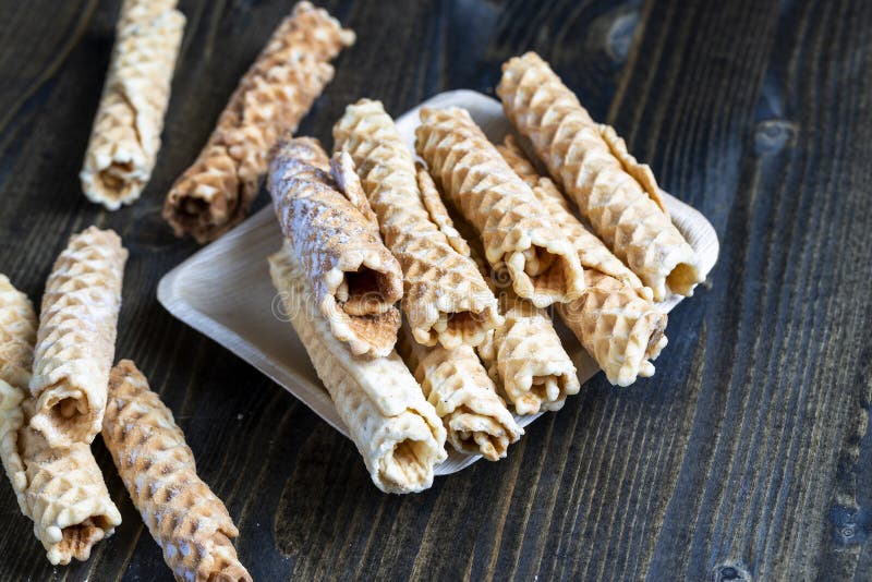 Waffle Tubes on a Wooden Table Stock Image - Image of food, stick ...