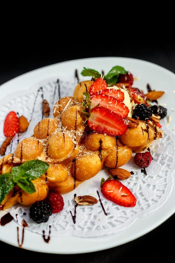 Waffles - a Ball of Italian Ice Cream with Berries and Nuts and Fresh ...