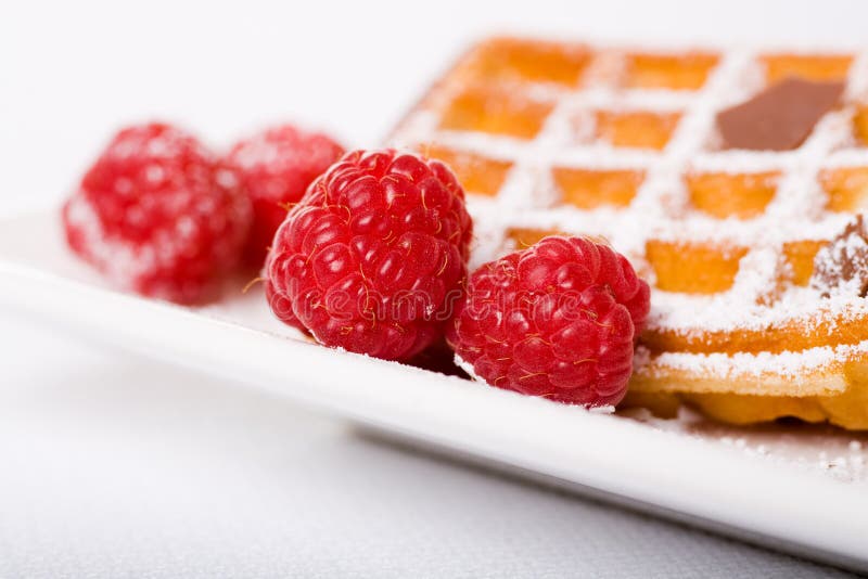 Waffles and raspberries stock photo. Image of snack, berries - 9106106