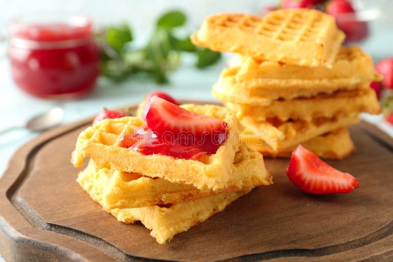 Waffles with Strawberry Jam on Board, Closeup Stock Image - Image of ...