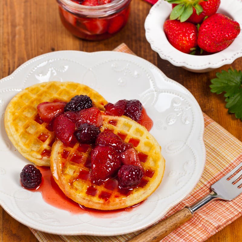 Waffles With Strawberry Syrup Stock Photo - Image of pastry, plate ...