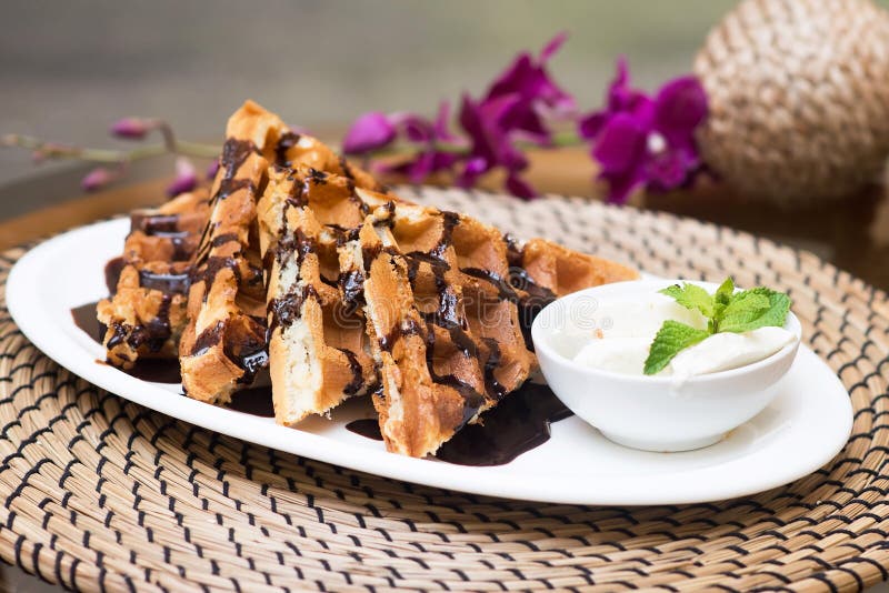Waffles on White Plate on the Table with Sauce Stock Photo - Image of ...