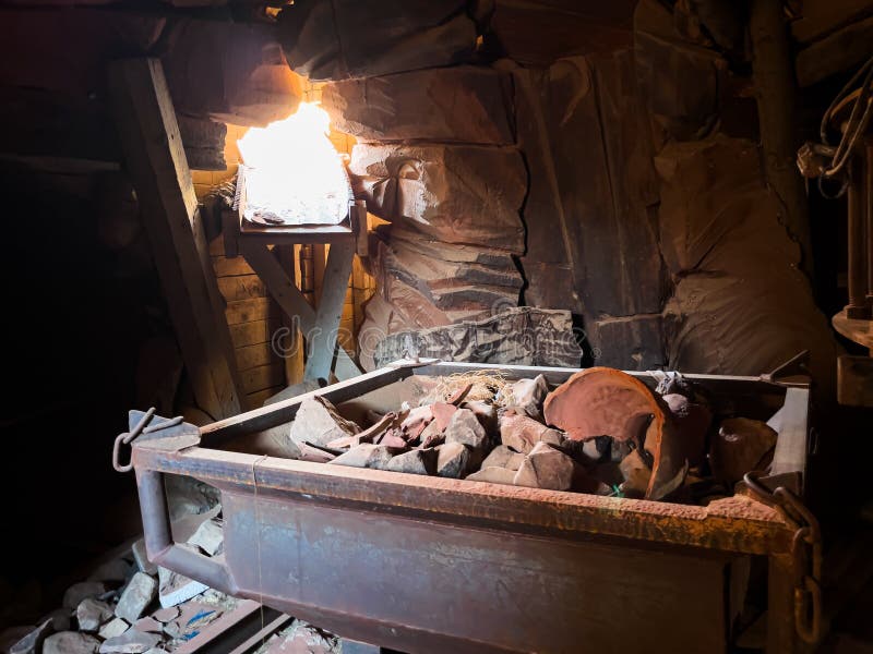 Wagon in Gold Mine Full of Ores and Rocks. Light Passing through a Hole ...