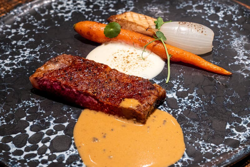 Wagyu Ribeye Steak with Grilled Vegetable Stock Image - Image of ...
