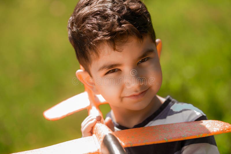 Waist Up of a Cute Boy with a Toy Plane Stock Image - Image of ...