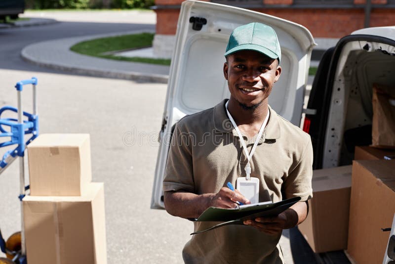 Black Man Doing Deliveries stock image. Image of mail - 259871025
