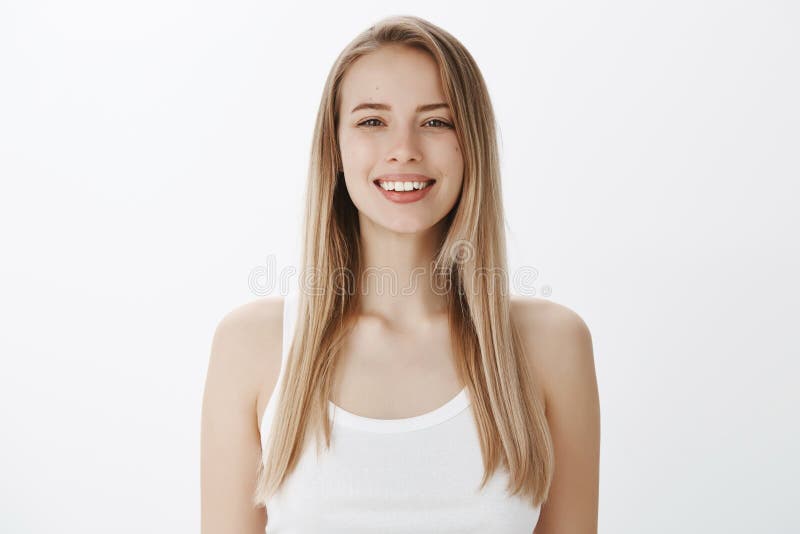 Waist Up Shot Of Pleasant Carefree And Friendly Attractive Woman With