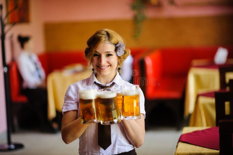 Waiter with beer stock image. Image of traditional, brown - 31673905