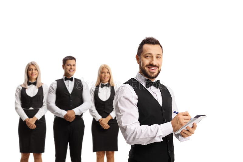 Waiter with a Bow Tie Writing and Other Waiters Standing in the Back ...