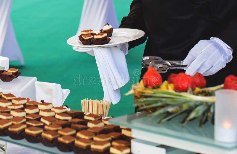 Waiter and buffet stock photo. Image of dinner, catering - 72642808