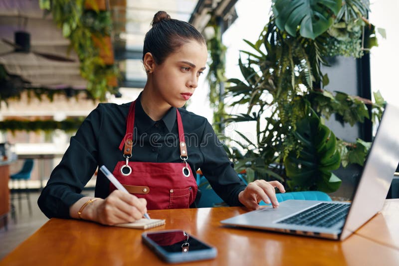 Waiter Checking Online Orders Stock Photo - Image of barista, computer ...